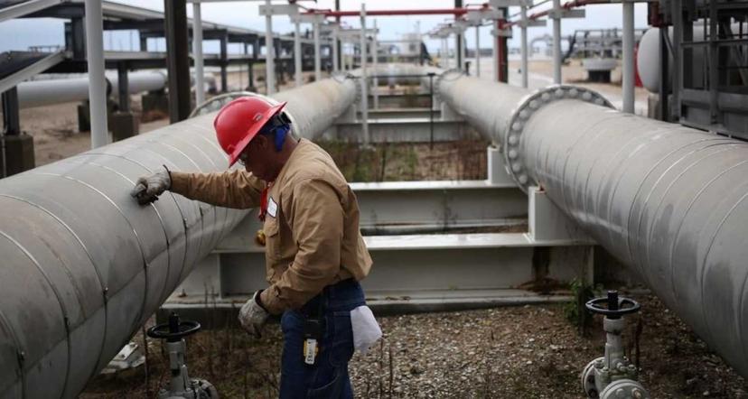 Crude oil prices fall below $100 a barrel